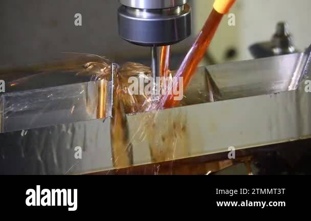 Close up scene the CNC milling machine cutting the tire mold parts with ...