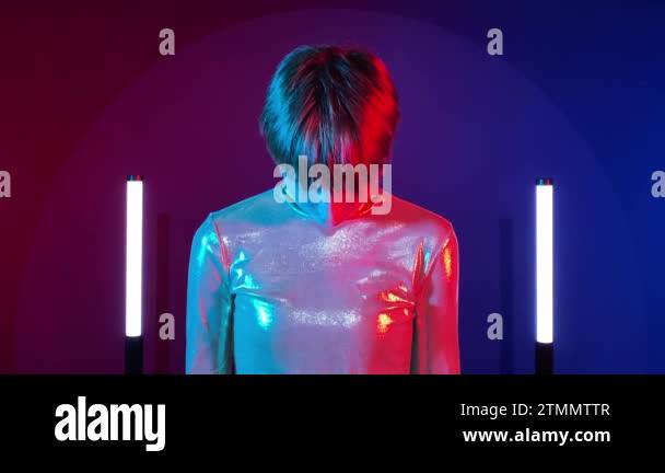 Female android robot turning on, having synthetic artificial smile in ...