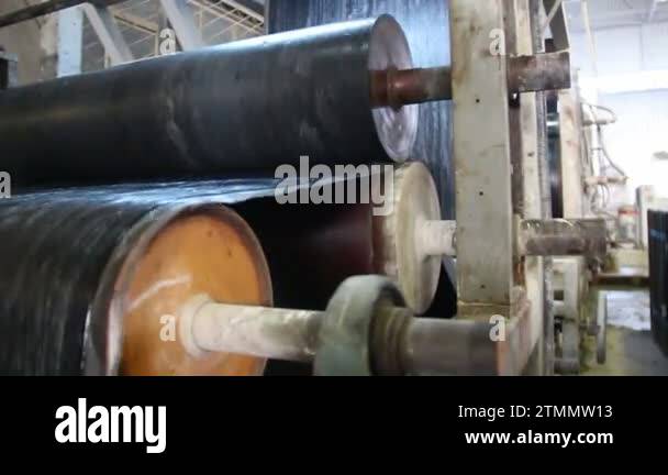 Production of bitumen roll. Rolling conveyors in a factory Stock Video ...