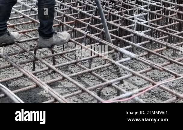 Pouring foundation of building. Compressor operation when pouring ...