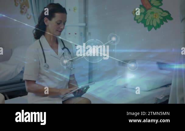 Animation of network of connections over caucasian female doctor using ...