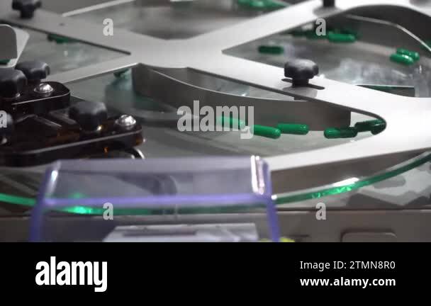 The drug capsules production process by automatic machine. The hi ...