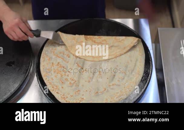 Process of pancake folding several times on pan Stock Video Footage - Alamy