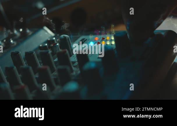 Close-up of fingers adjusting sound mixing console. Mixer console for ...