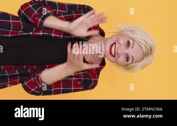 Vertical video. Bravo applause. Grimacing woman. Well done. Skeptic ...