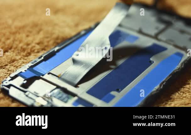 Macro view of smartphone laying on a surface. Someone mad breaking the ...