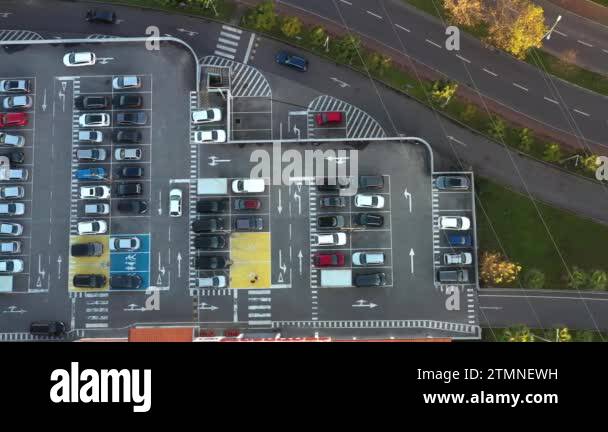 Aerial view of large car parking with many parked cars. Car park near ...