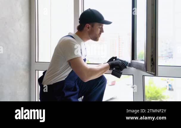 Worker man installs windows Stock Videos & Footage - HD and 4K Video ...