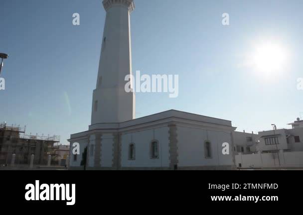 Tilt of Lighthouse of Torre Canne with flare Stock Video Footage - Alamy