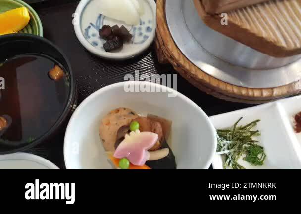 kamameshi Japanese traditional food bake rice food set in iron pot tea ...