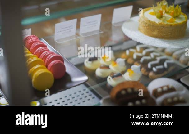 Coffee and pastry bar. Counter. On a glass surface desserts are exposed ...