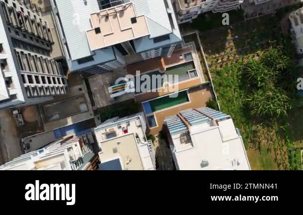 Indulge in stunning rooftop vistas as the drone provides an aerial perspective of the ...