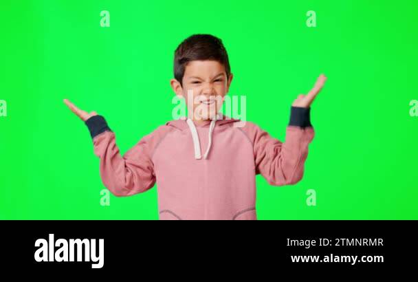 Green screen, confused and annoyed child shrugging shoulders feeling ...