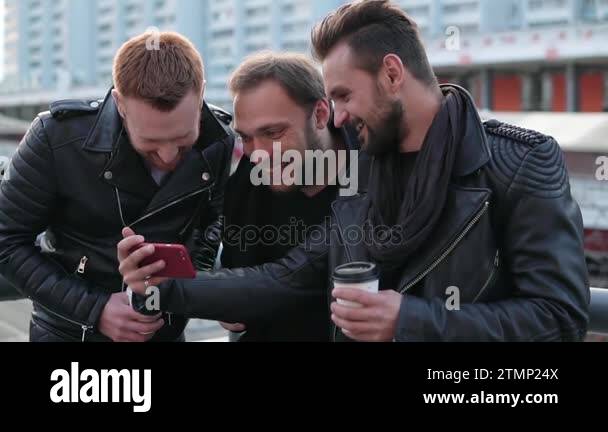 Three young men display Stock Videos & Footage - HD and 4K Video Clips ...