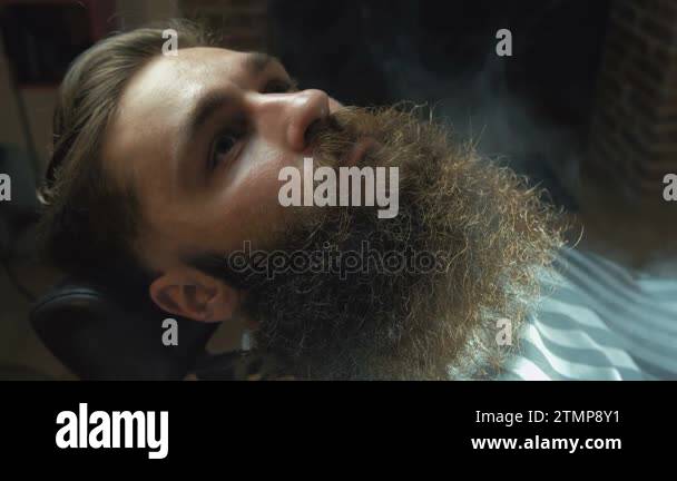 Shaving process of beards in Barbershop. Steam shave Stock Video ...