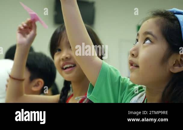 4K : Asian child learning to folding Japanese paper origami, art of ...