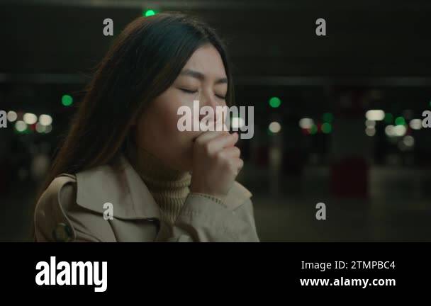 Unhealthy sick Asian woman coughing flu symptom allergy chinese japanese girl female stand in ...