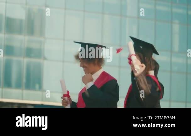 Graduation cap on diplomas Stock Videos & Footage - HD and 4K Video ...