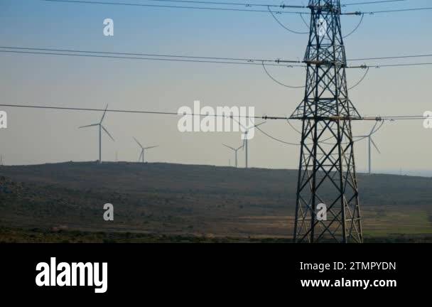 Electricity pylon wind turbines Stock Videos & Footage - HD and 4K ...