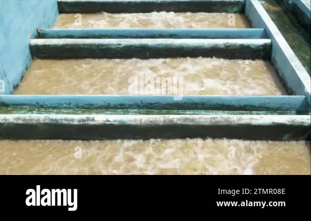 Dirty sewage from the pipe, environmental pollution being processed on ...