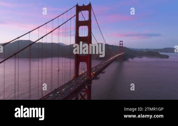 Beautiful drone footage of red suspension bridge with night ...