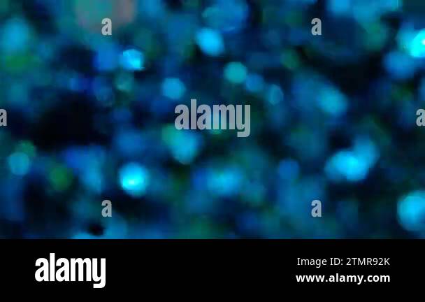 Golden glitter background. Beautiful transition with real gold particles. flying in wind on ...