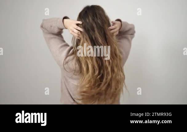 Back view woman combing Stock Videos & Footage - HD and 4K Video Clips ...
