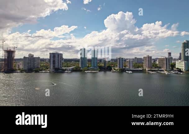 Establishing aerial drone shot in Miami Florida. Drone moves from left ...