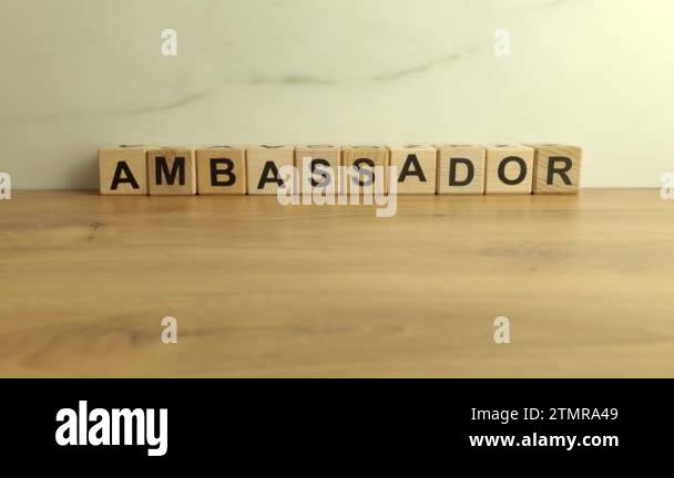 Ambassador word from wooden blocks on desk Stock Video Footage - Alamy
