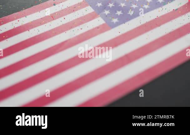 Animation of confetti falling over flags of united states of america ...