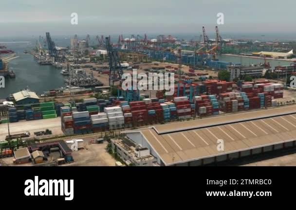 Sea port with container ships and cranes in the loading area. Tanjung ...