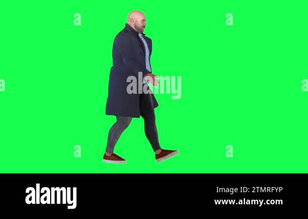 Walking along with the portrayal of a tall fat man in a navy overcoat ...