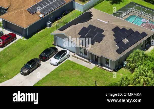 Standard american residential house with rooftop covered with solar ...