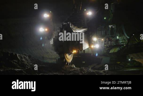 Giant Mining Excavator On The Bottom Surface digger Mine mineral ore 4k ...