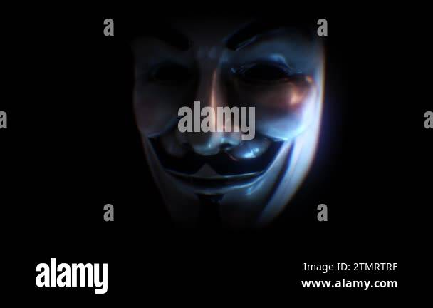 A dark moodily lit Guy Fawkes mask as made famous by the movie V For ...