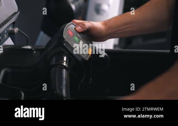Control interface, Speed adjustment, Fitness equipment. Mans hands can ...
