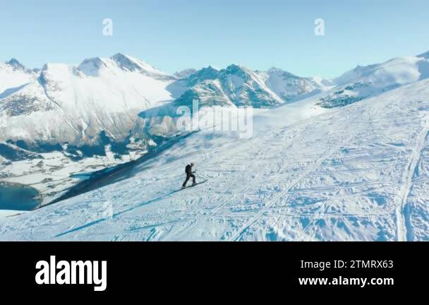 Inspiring and cinematic free ride skier concept. Solo backcountry rider ...