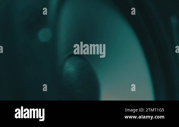 Vibrating speakers membranes of professional sound speaker in close up ...