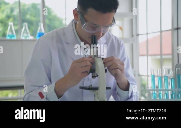 Research concept of 4k resolution. Asian scientists are examining the ...