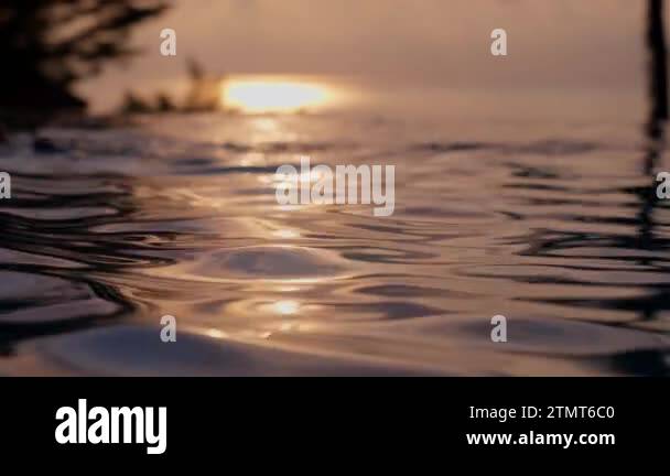 A video showing the reflection of the sunlight on the water of the ...