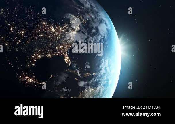 Cinematic view from a satellite orbit of the planet. The sun rises over ...