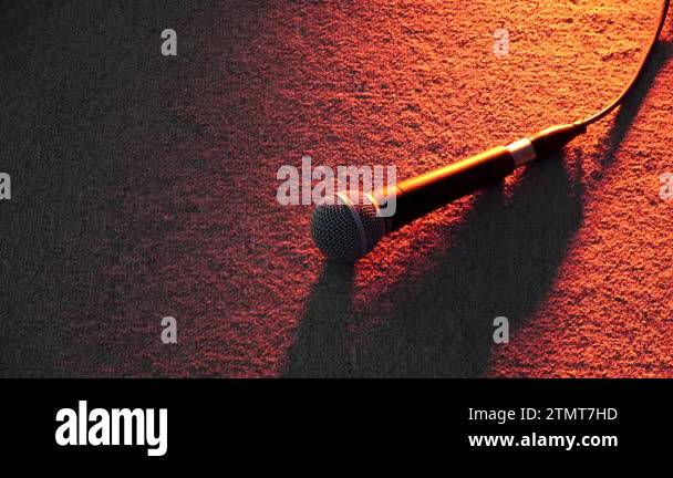 Shure SM58 microphone. Pick up the microphone from the floor Stock ...