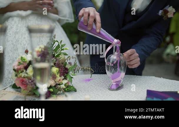 A wedding ceremony with a mixed family. The groom, mother, and son ...