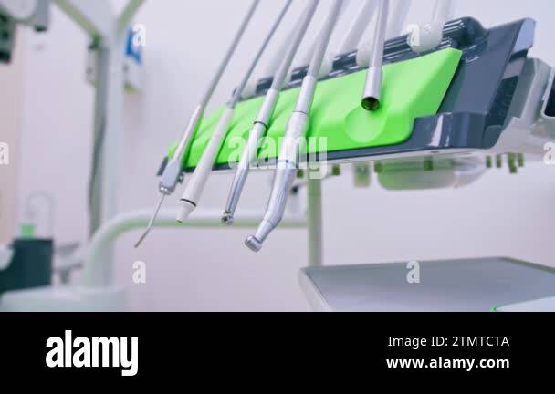 unit with tools of the dental chair The modern dental office is ...