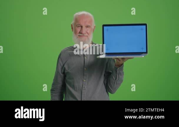 Green Screen.Portrait of an Old Man with a Laptop with Blue Screen ...