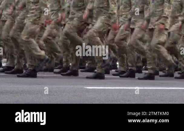Military men marching in the parade. Soldiers legs. Boots forces and ...