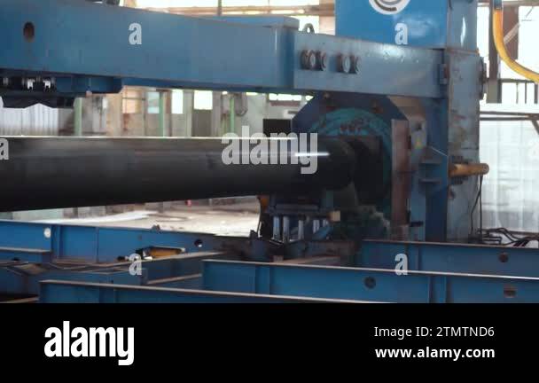 Pipe manufacturing plant. Pipe plant. Iron pipe welding. Pipe expansion ...