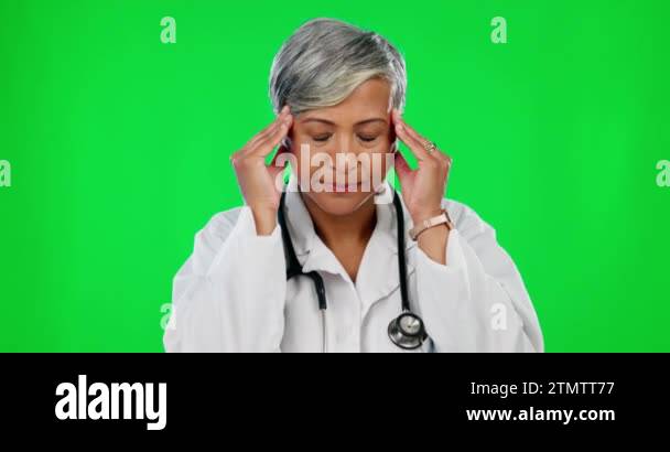 Stress, doctor and headache with woman on green screen for anxiety ...