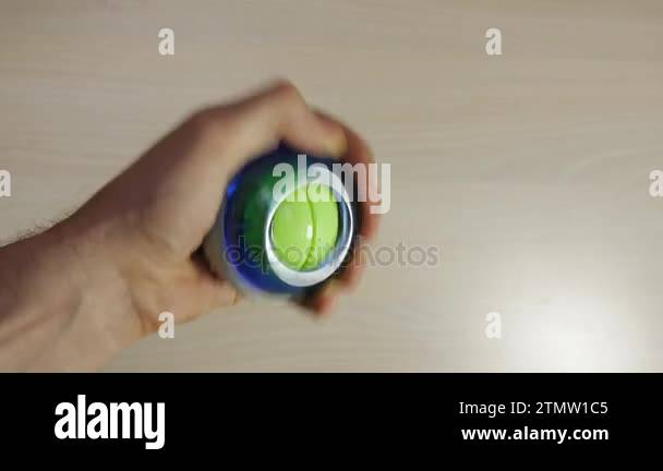 Man rotates the wrist ball, strengthens muscles in hand, fingers, wrist ...