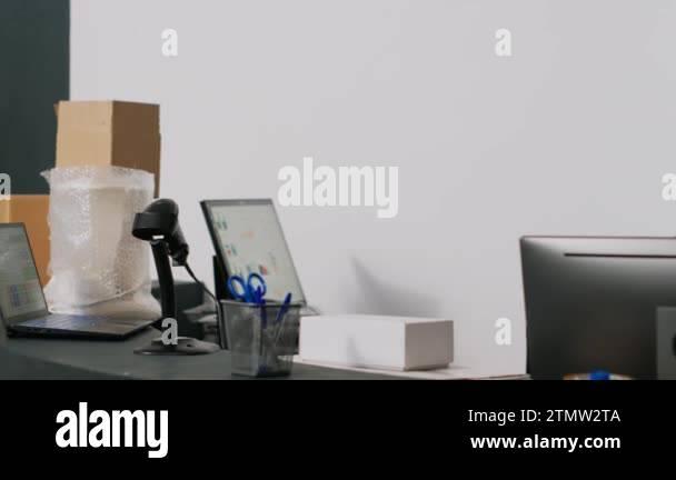 Diverse people checking computer list with orders, reviewing packages ...